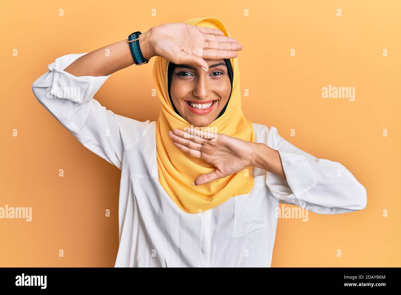 Young brunette arab woman wearing traditional islamic hijab scarf ...