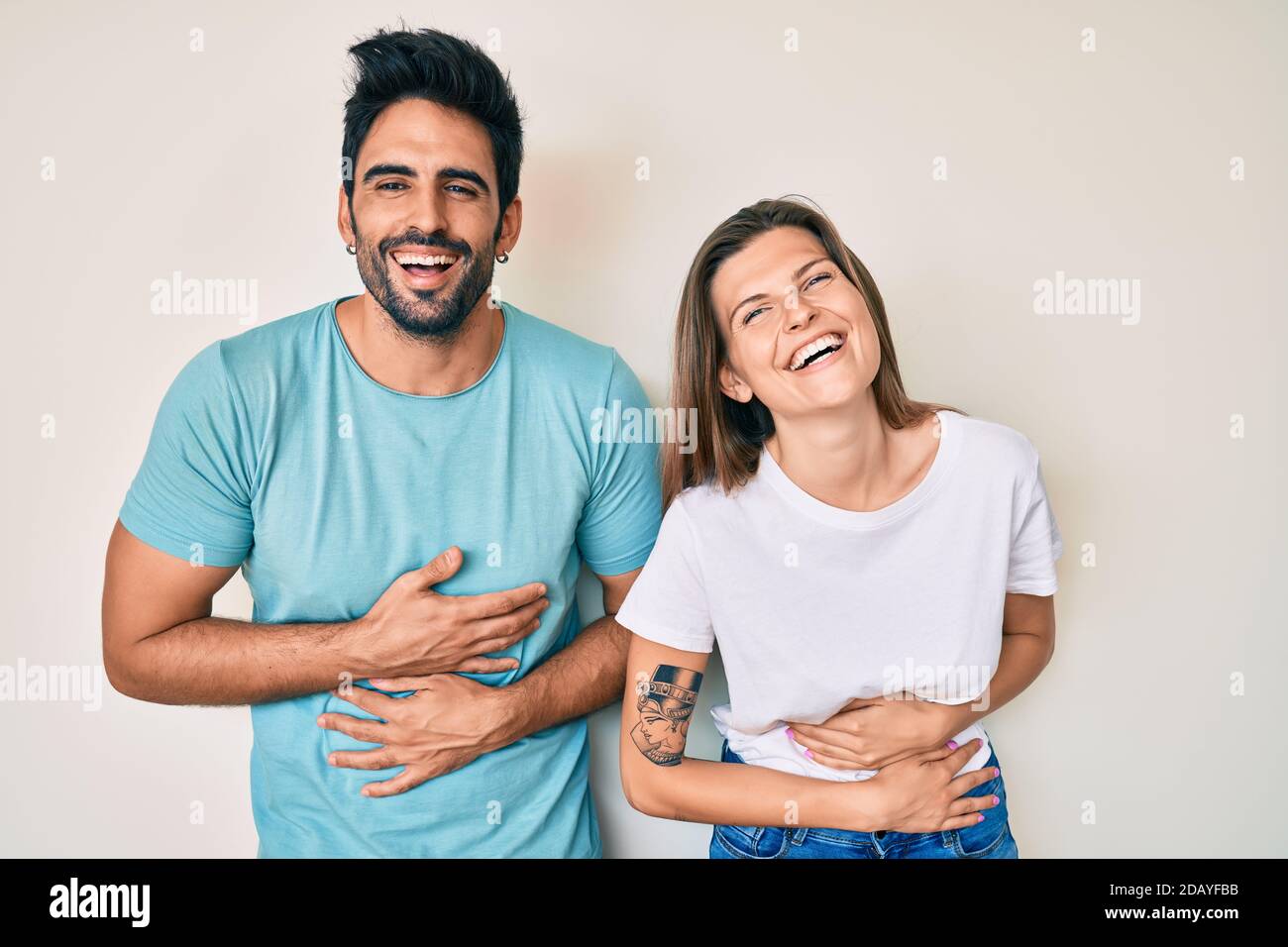 Beautiful young couple of boyfriend and girlfriend together smiling and ...