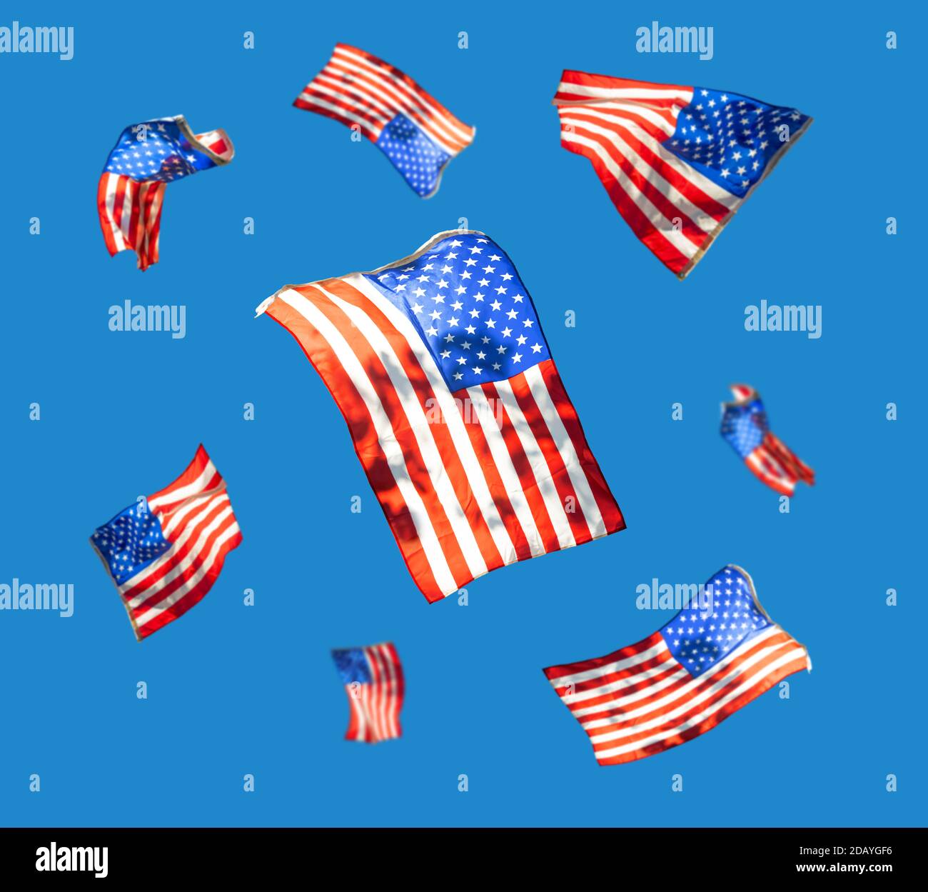 The national flags of the United States of America flying in the wind ...