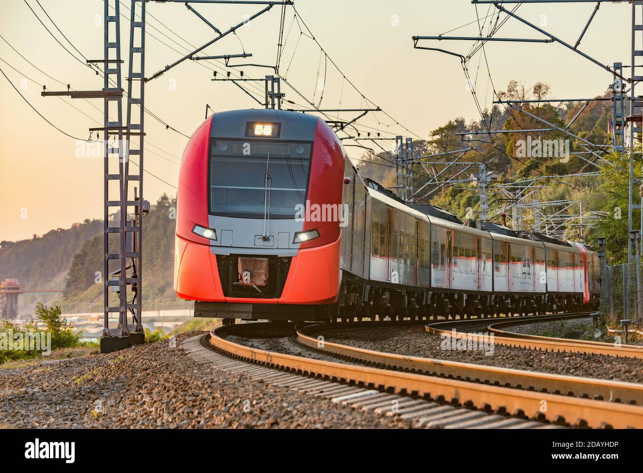 Passenger train moves along Black sea coast.. Sochi. Russia Stock Photo ...