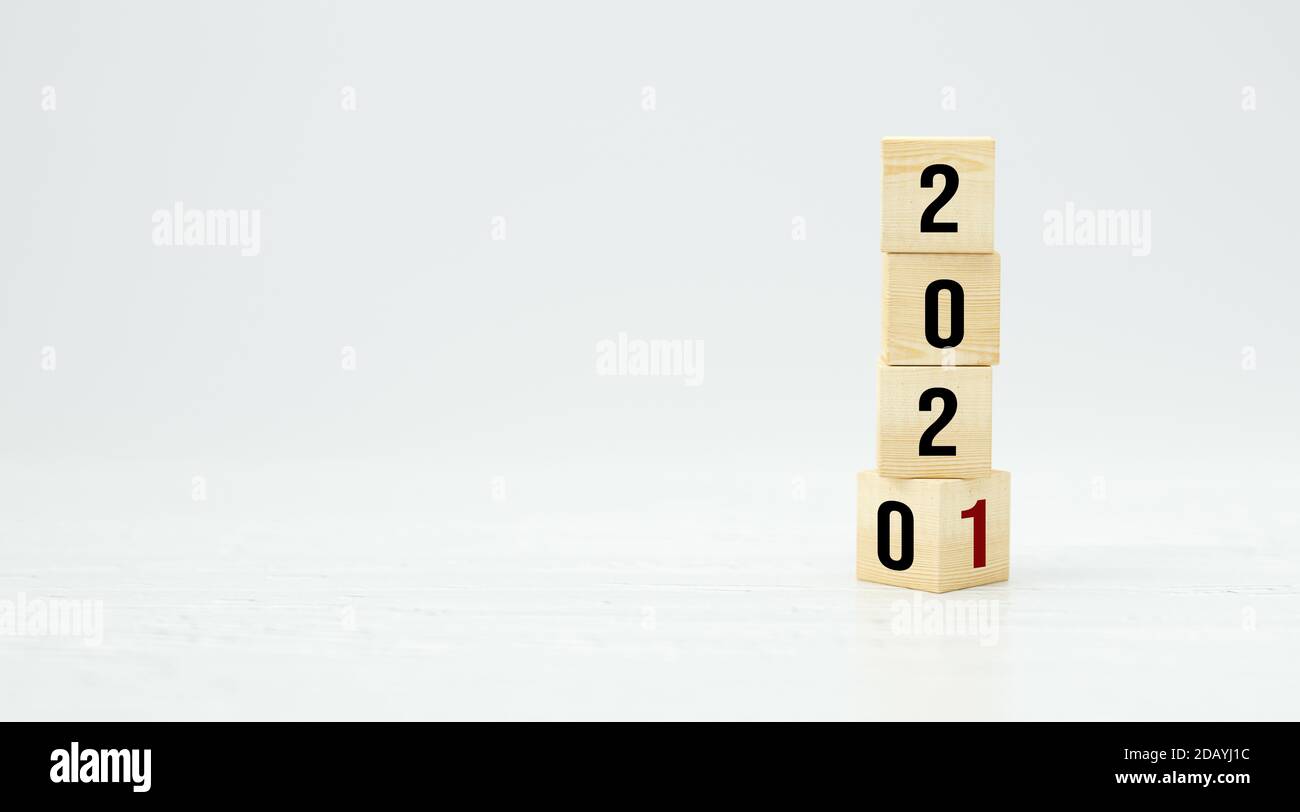 cubes showing the number 2020 turning to 2021 on white background - 3d ...
