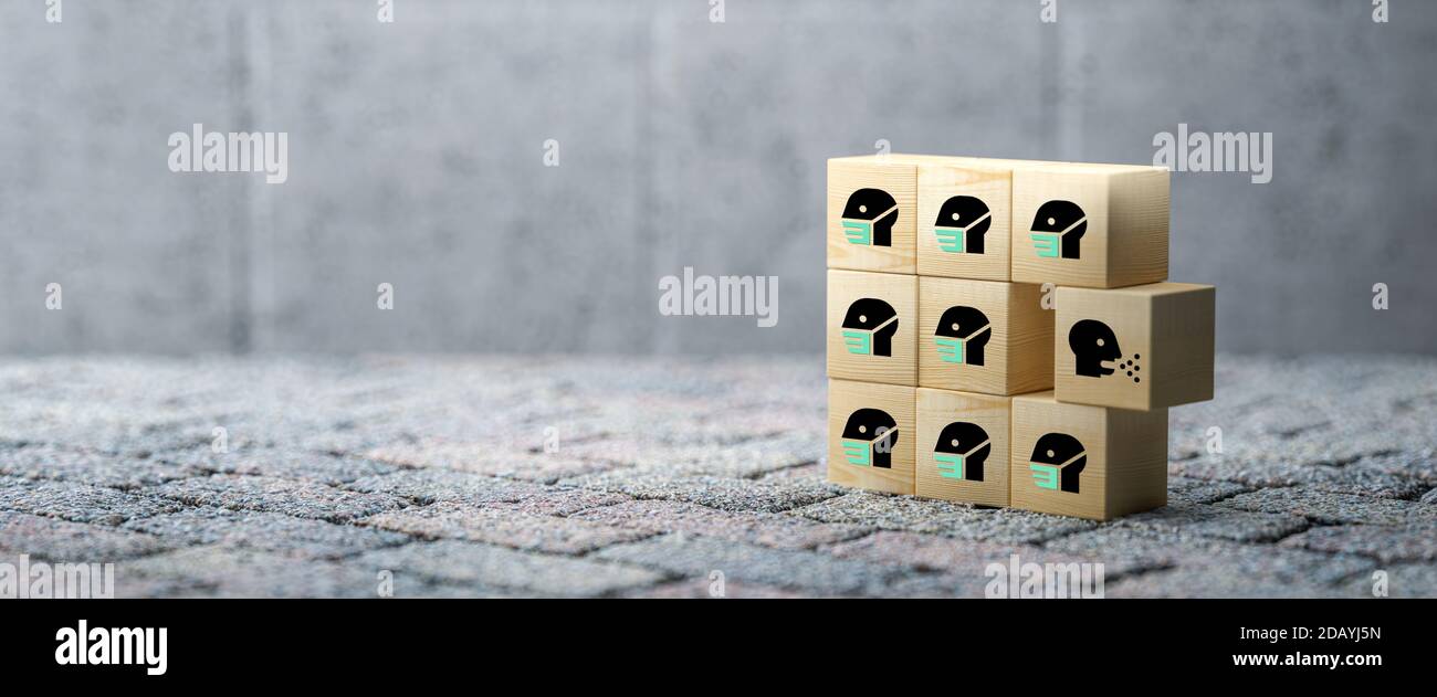 many cubes with people in face masks symbols with a face mask and one ...