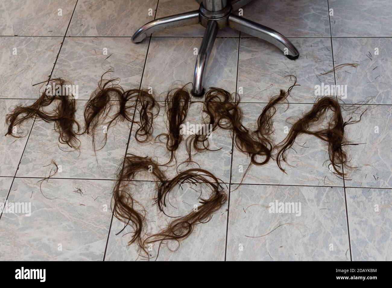 Abstract background of name Amina made by cut hair Stock Photo - Alamy