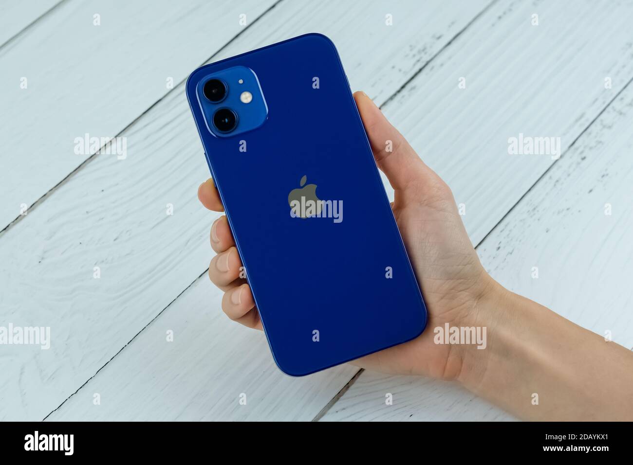 iPhone 12 in blue next to its box Stock Photo - Alamy