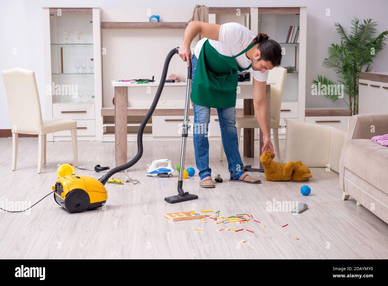 House maid cleaning house with kids hi-res stock photography and images ...