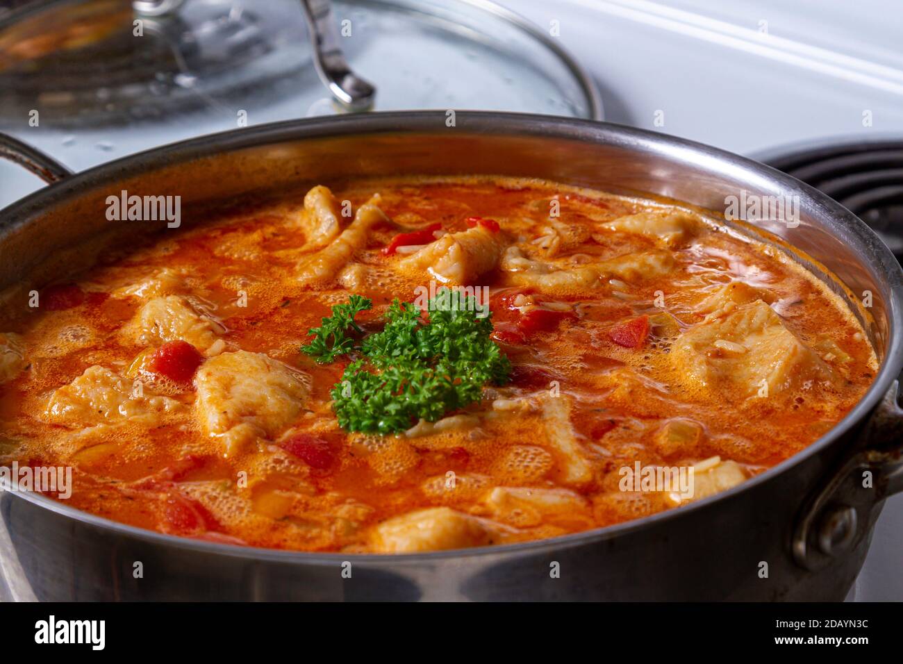 Cajun fish stew, simmering in a pan Stock Photo - Alamy