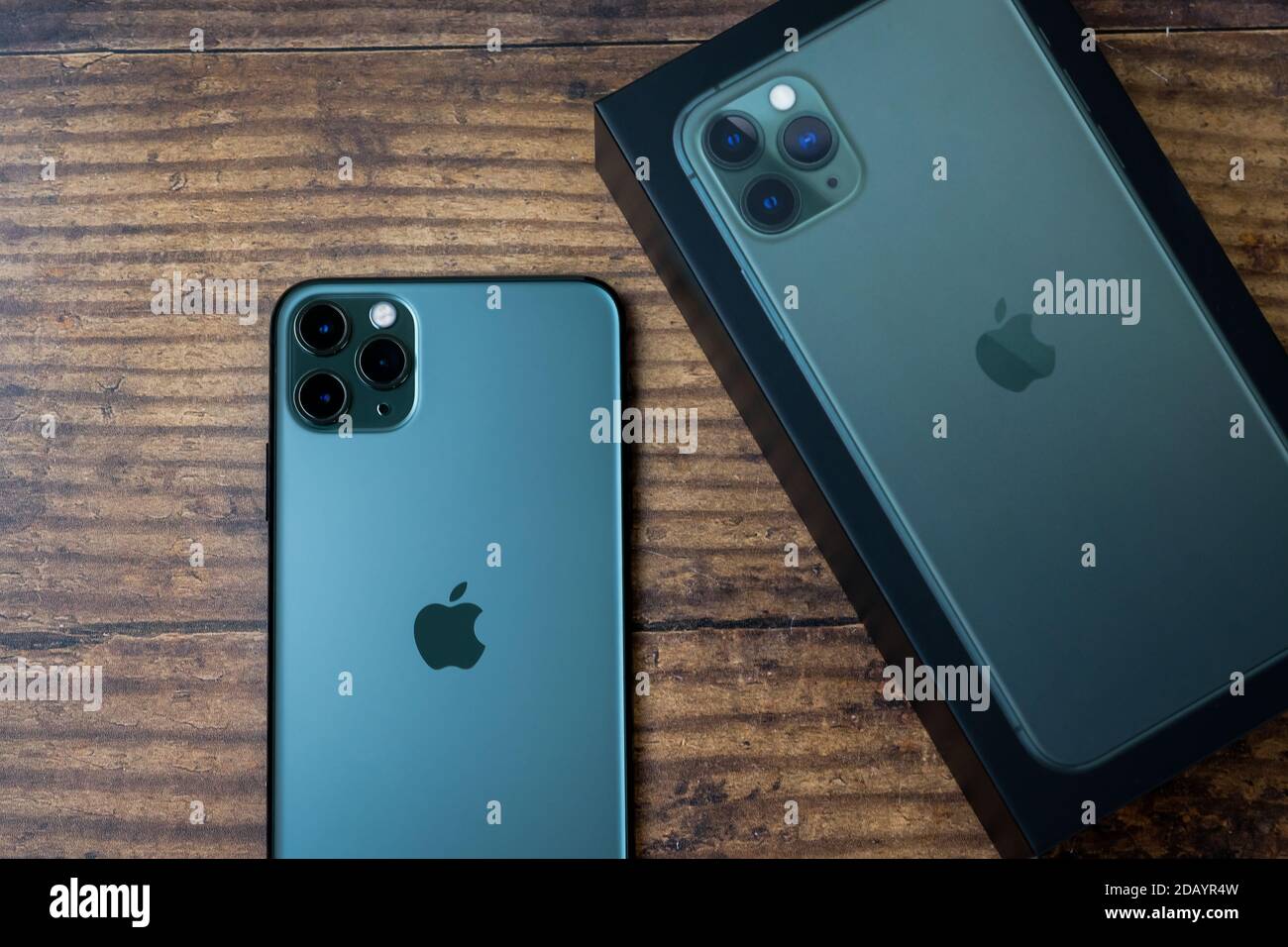 iPhone 11 Pro Max in midnight green color next to its box Stock Photo ...
