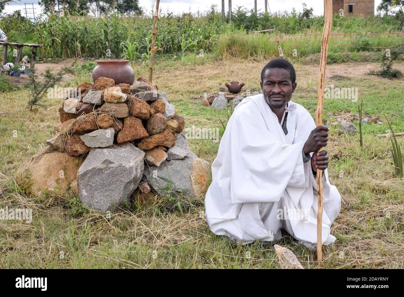 Prophet Garikai Chirume, of the apostles of red garments, sits near a ...