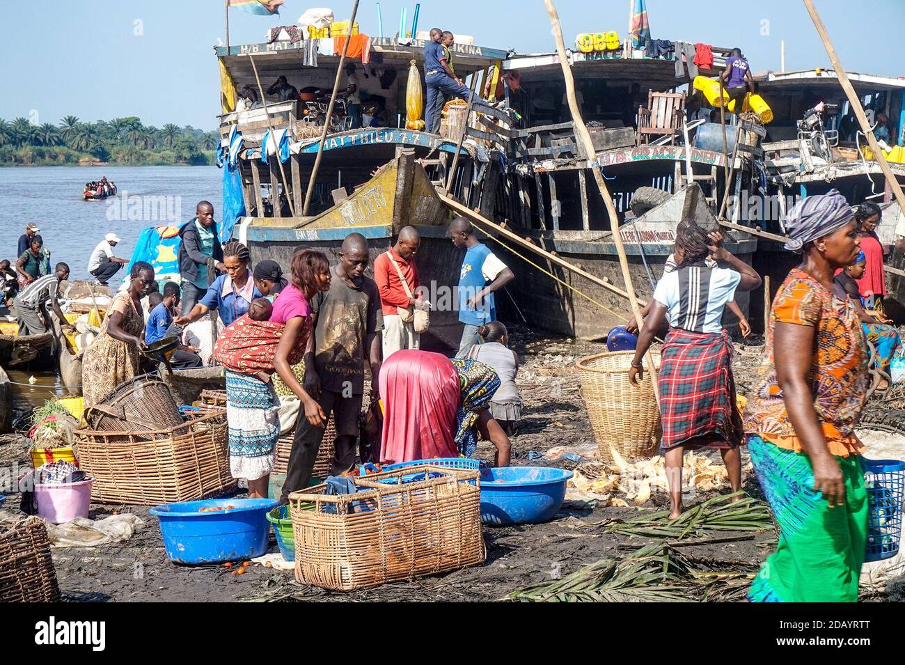 People prepare to board a ferry on the Congo River in Democratic ...