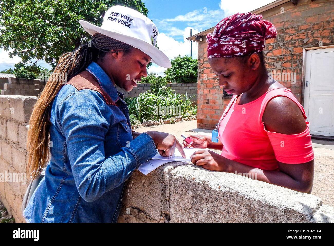 In the Entumbane suburb of Bulawayo, Zimbabwe, Juliet Rusafeti (left ...