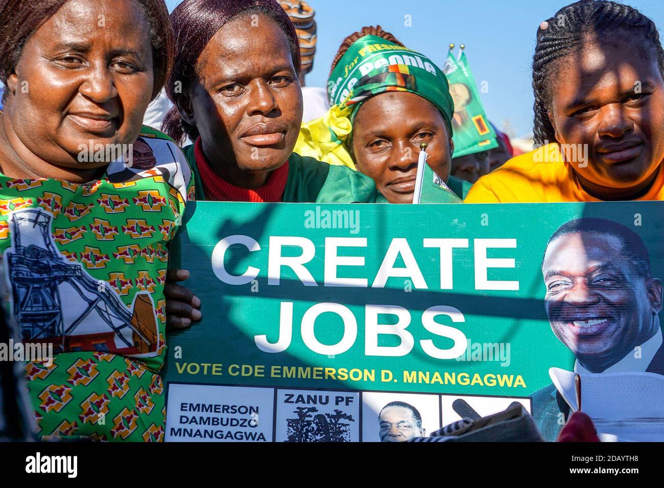 Women hold up placards supporting Emmerson Mnangagwa, Zimbabwe’s ...
