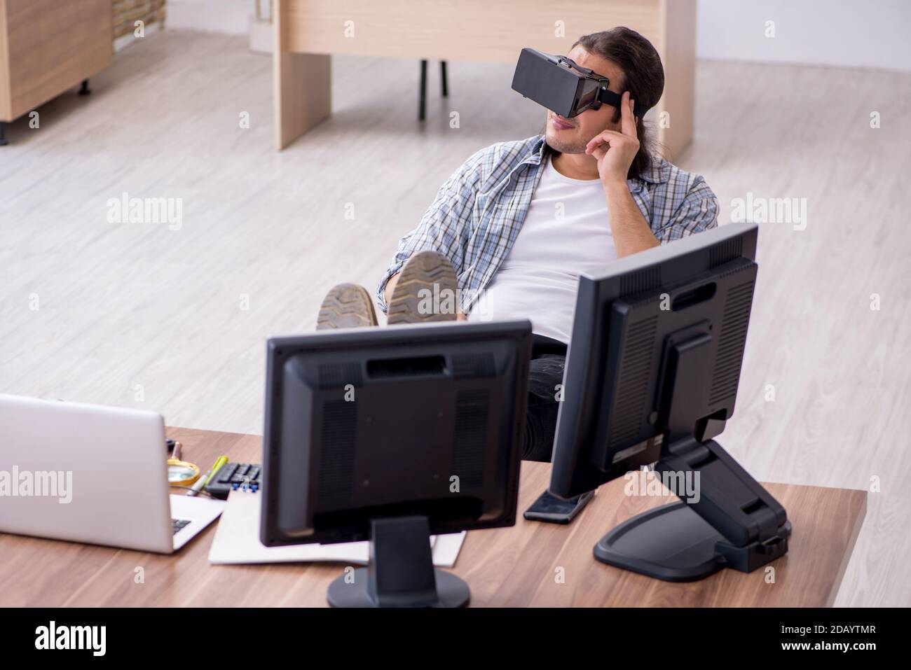 Male it specialist working in the office Stock Photo - Alamy