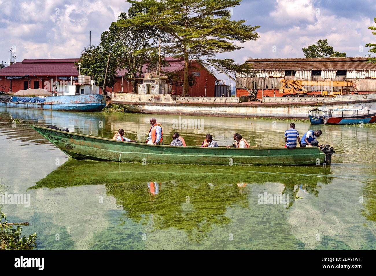 Travelers depart from the Port Bell Landing Site on Lake Victoria in ...