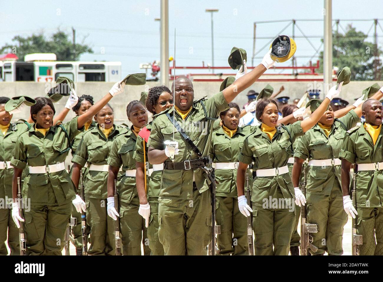 Zambian police officers remove their caps as a way to thank Stephen ...