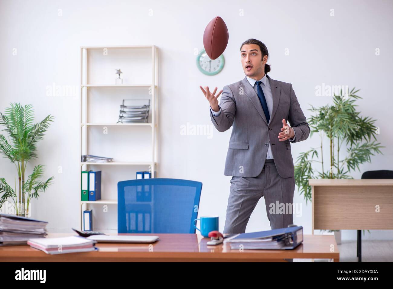 Successful male athlete throwing ball hi-res stock photography and ...