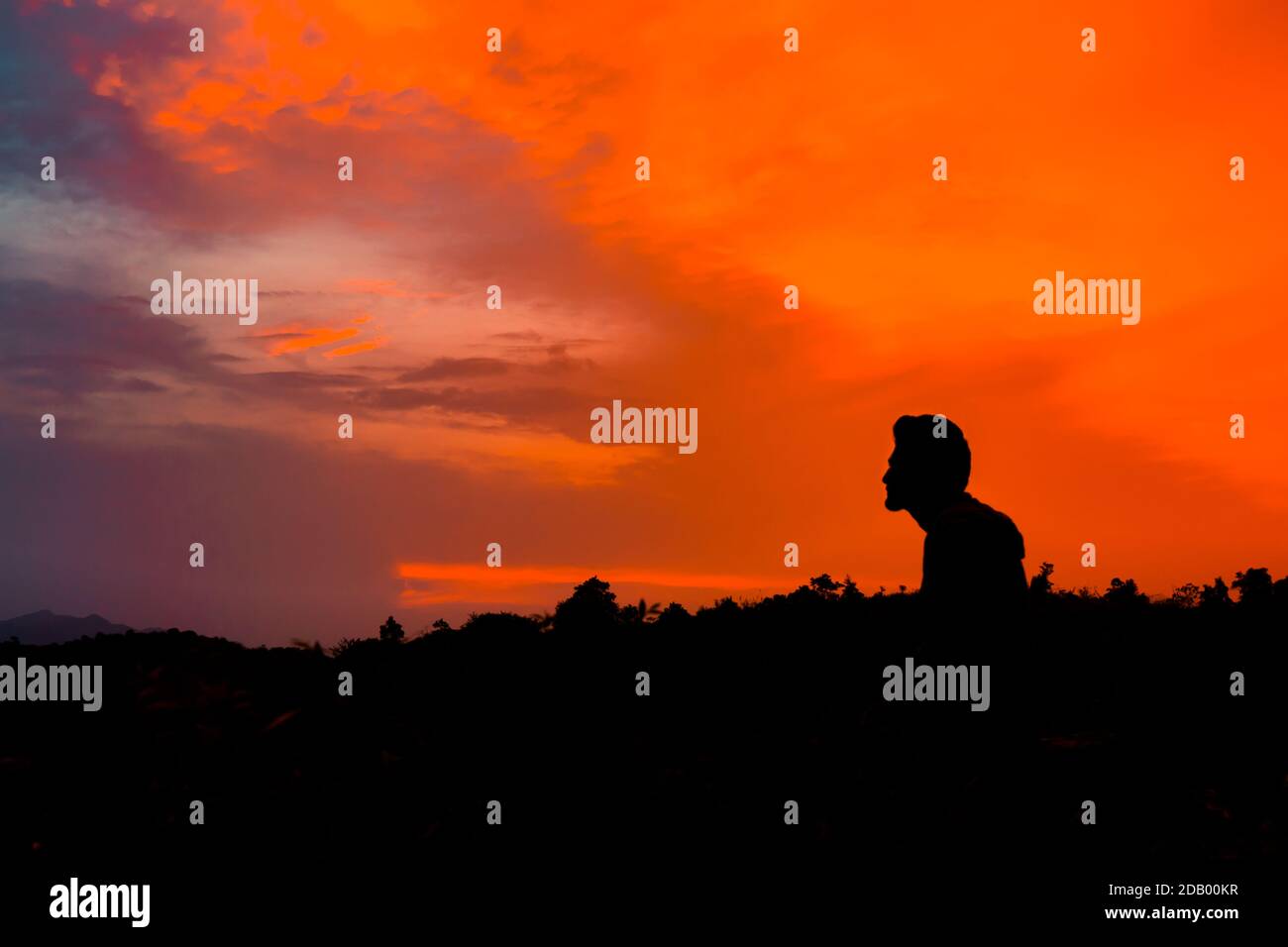 Person sitting alone hi-res stock photography and images - Alamy