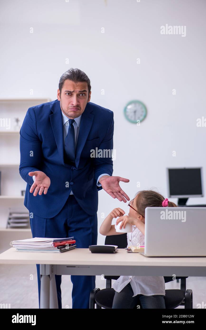 Father secretary and daughter boss in funny concept Stock Photo - Alamy
