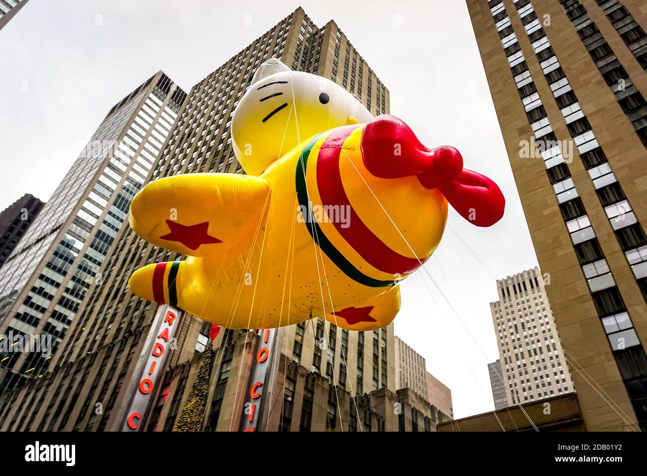 The Hello Kitty balloon floats in the air during Macy's Thanksgiving ...