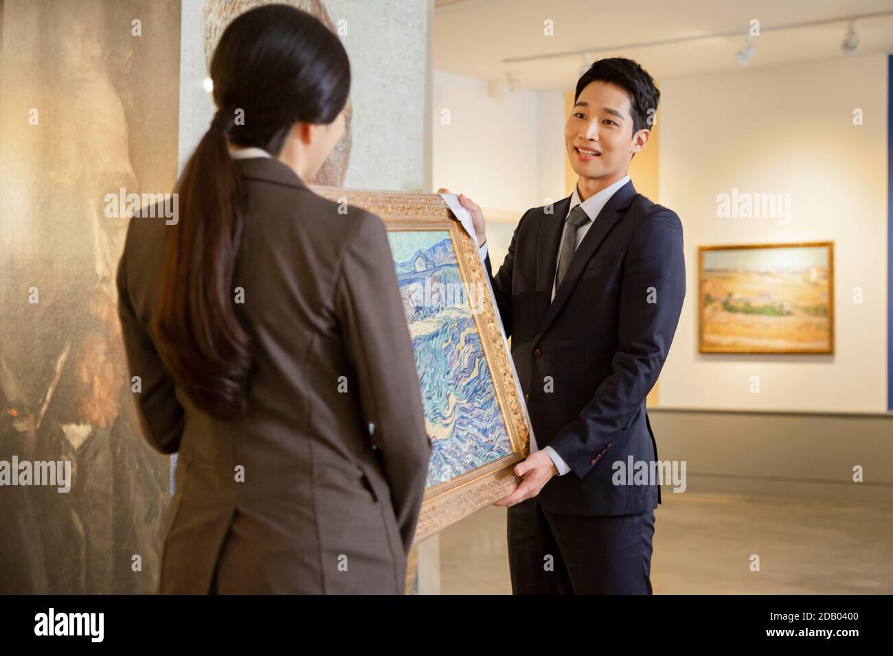 People with guide at exhibition in art gallery 017 Stock Photo - Alamy