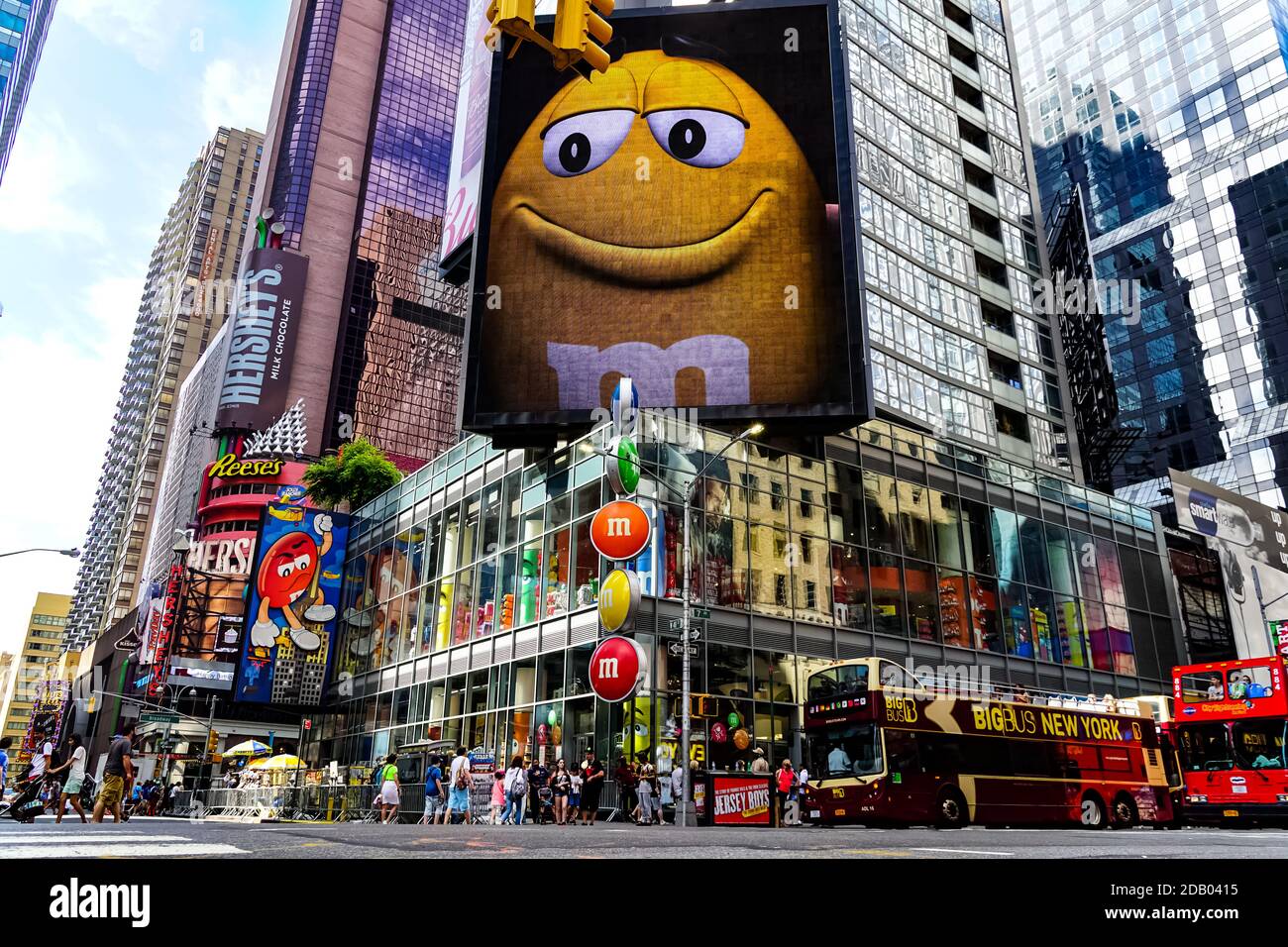 M&M'S World store next to Times Square with tour buses driving through ...