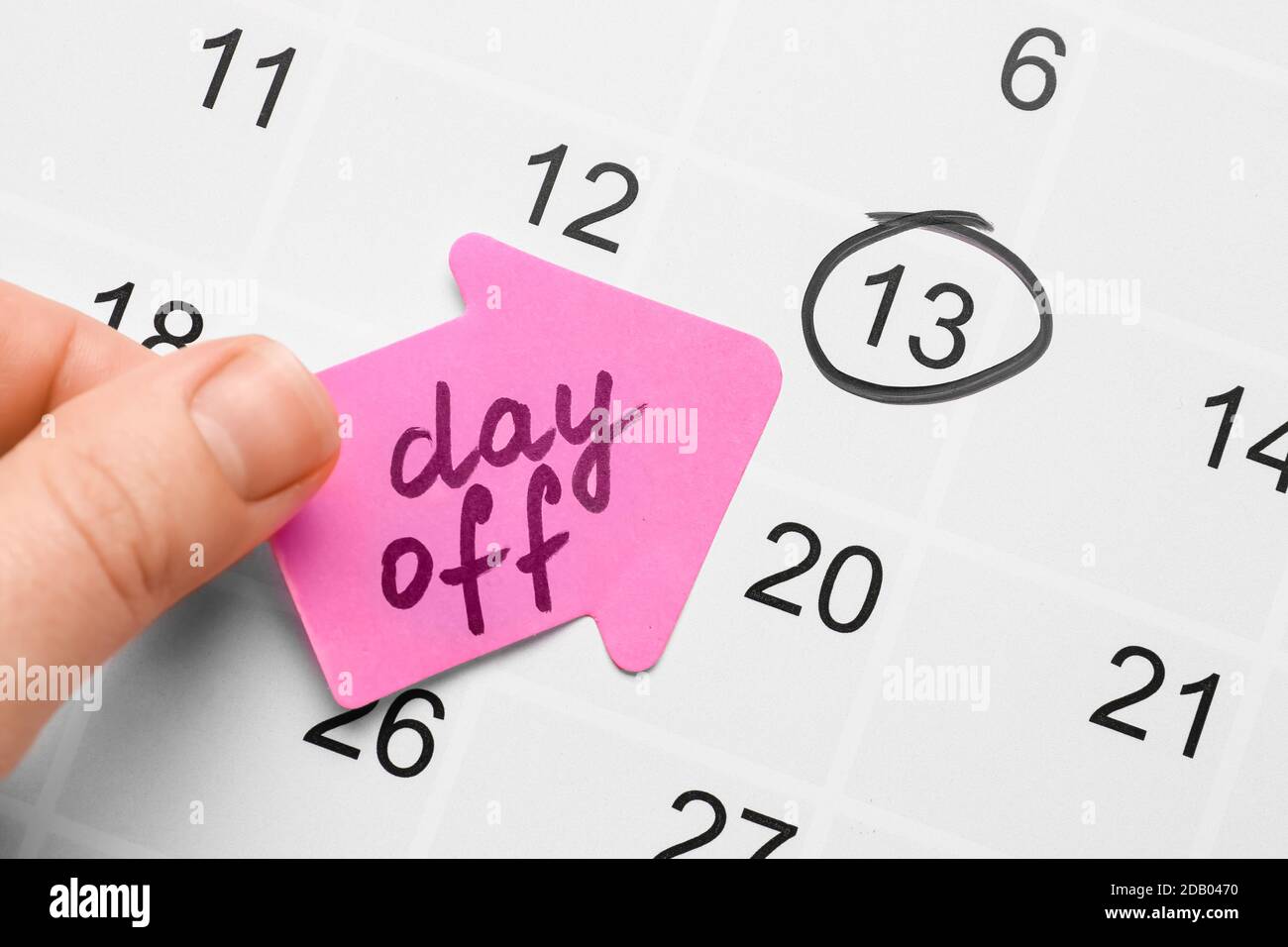 Woman marking day off in calendar, closeup Stock Photo - Alamy