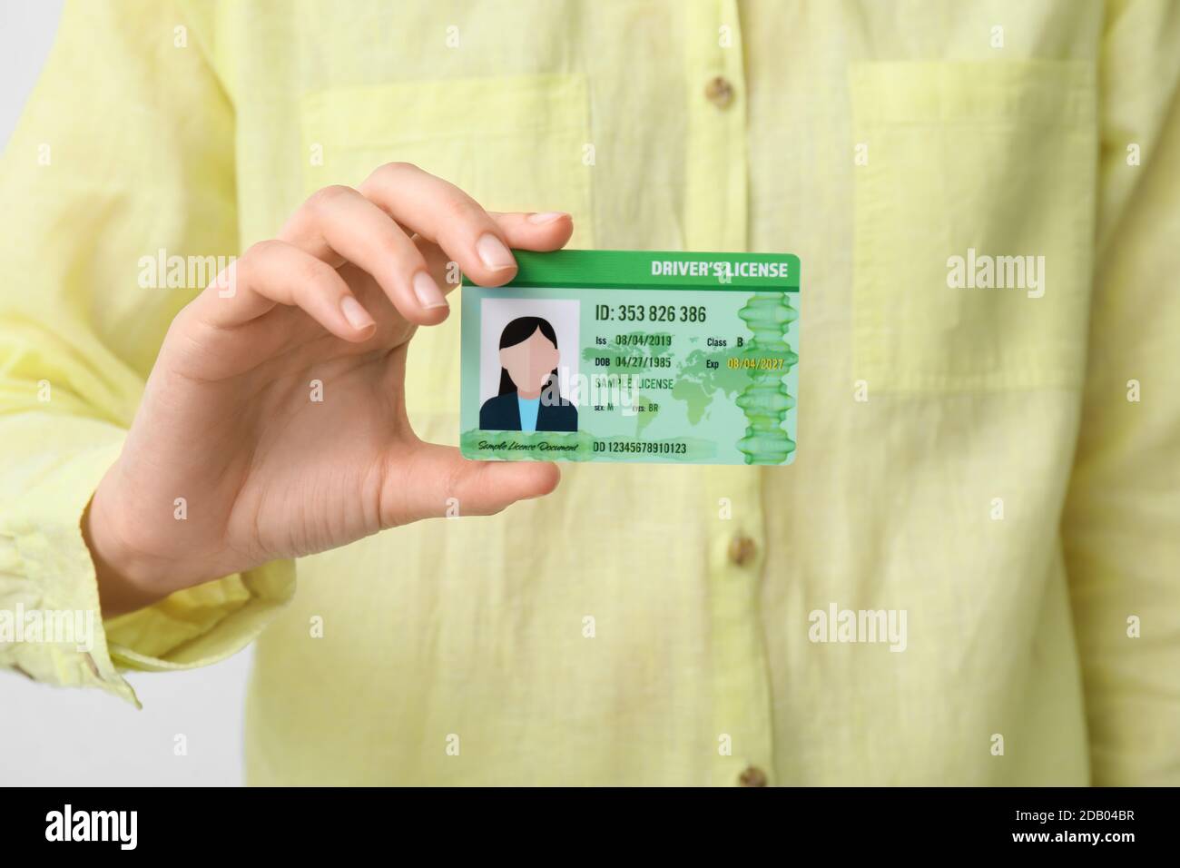 Woman with driving license, closeup Stock Photo - Alamy