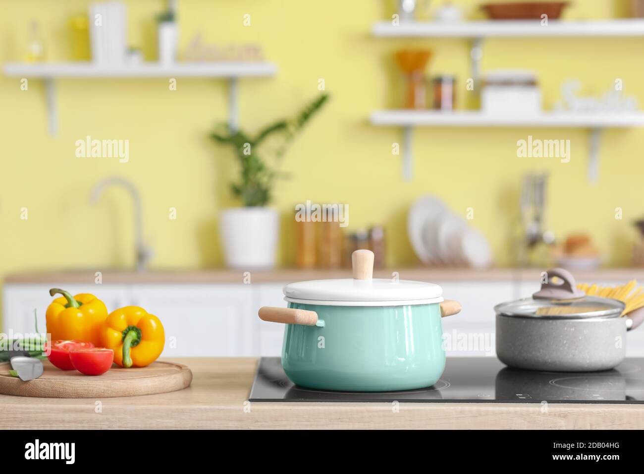 Cooking pots on stove hi-res stock photography and images - Alamy