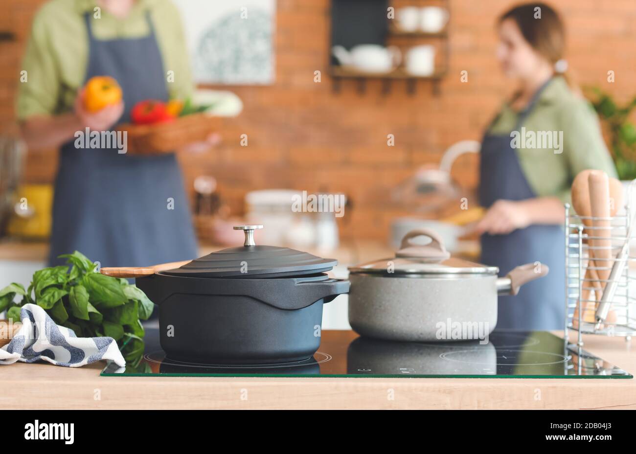 Cooking pots on stove hi-res stock photography and images - Alamy