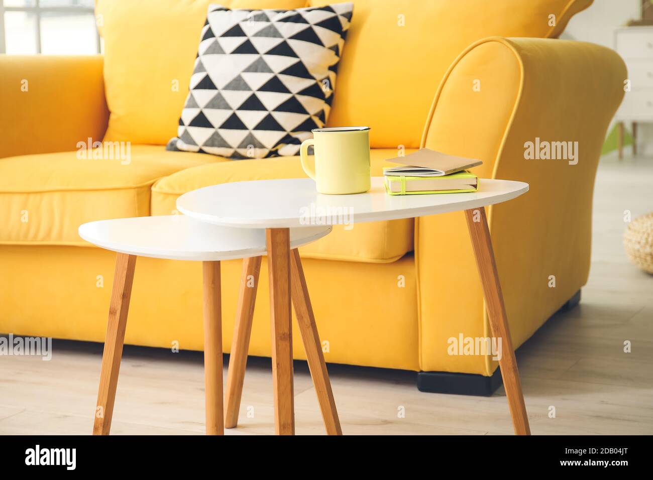 Interior of living room with sofa and table Stock Photo - Alamy