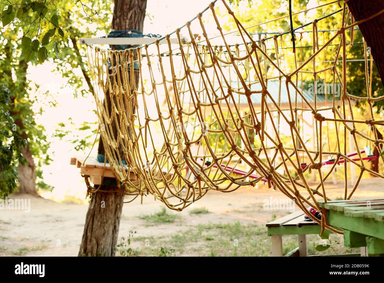 Hanging net in adventure park Stock Photo - Alamy