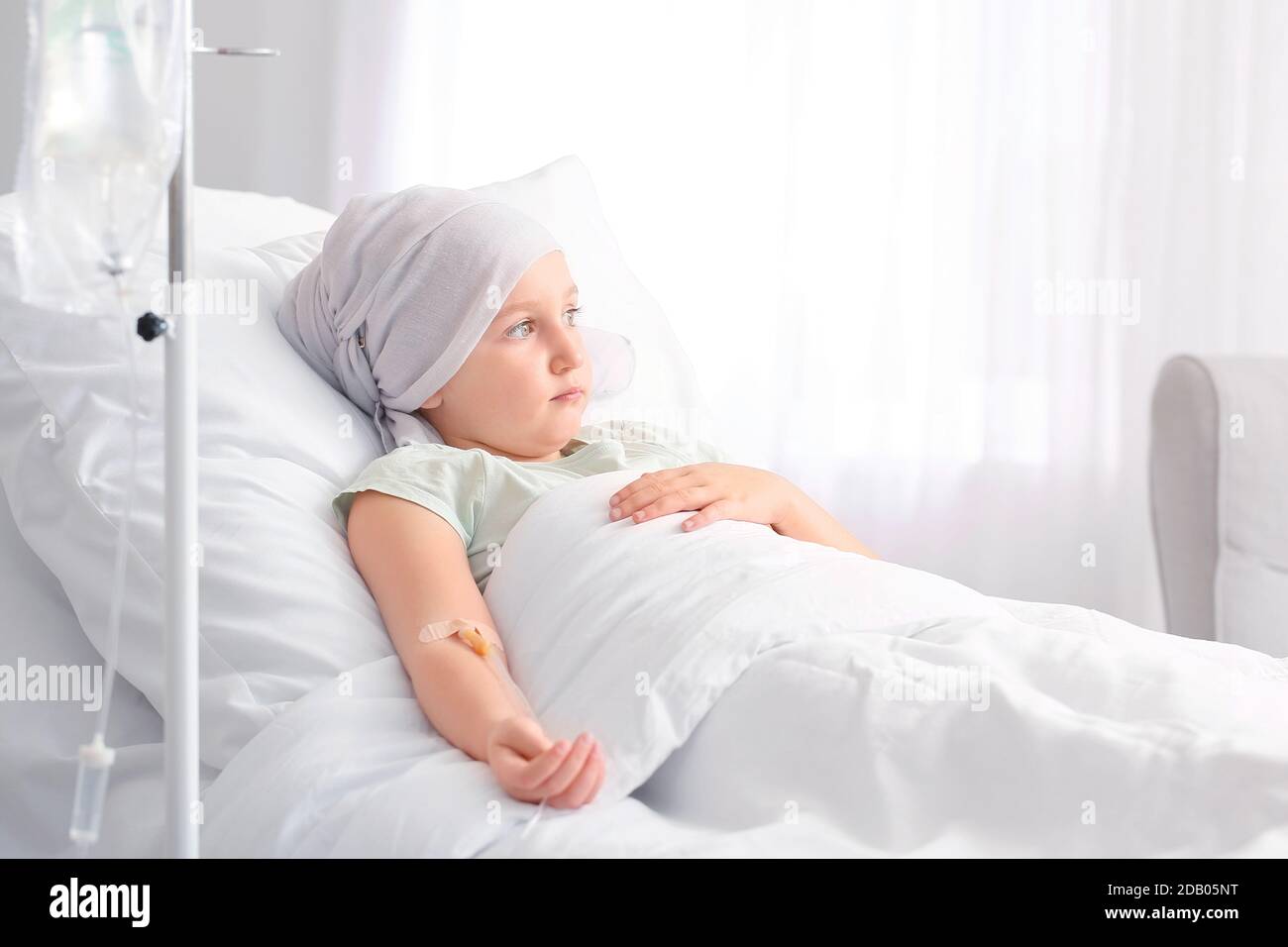 Little girl undergoing course of chemotherapy in clinic Stock Photo - Alamy