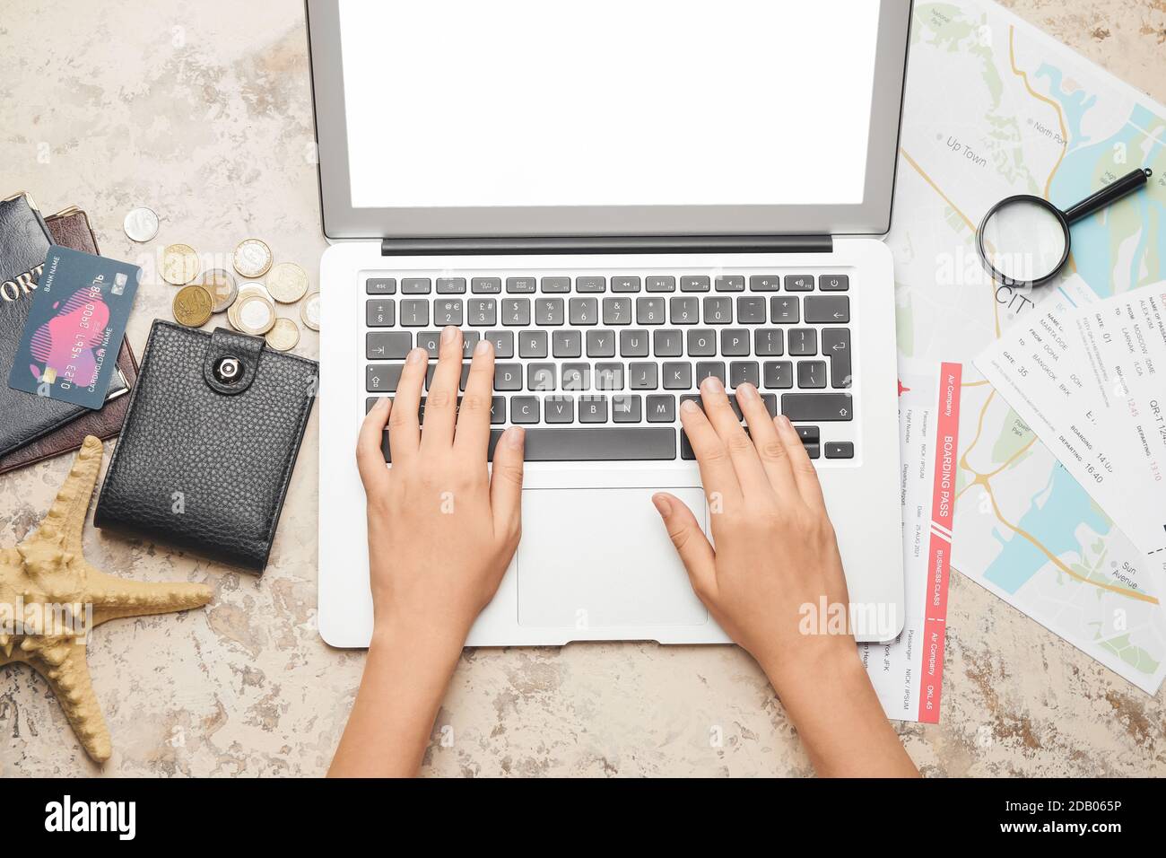 Travel agent choosing tour for client in office Stock Photo - Alamy