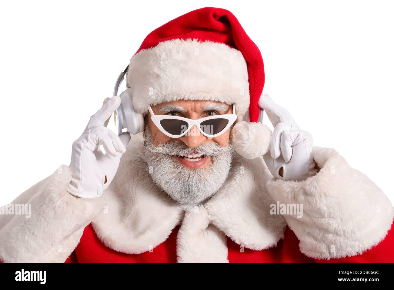 Cool Santa Claus listening to music on white background Stock Photo - Alamy