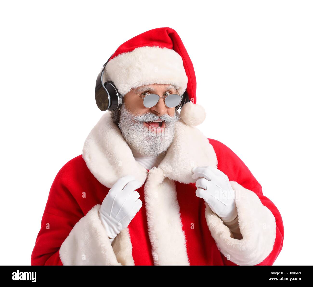 Cool Santa Claus listening to music on white background Stock Photo - Alamy