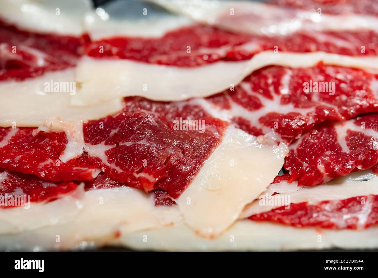 fresh raw fatty beef slices Stock Photo - Alamy