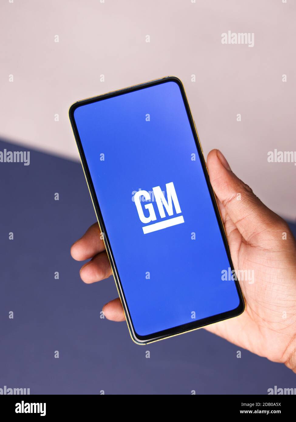 Assam, india - November 15, 2020 : General motors logo on phone screen ...