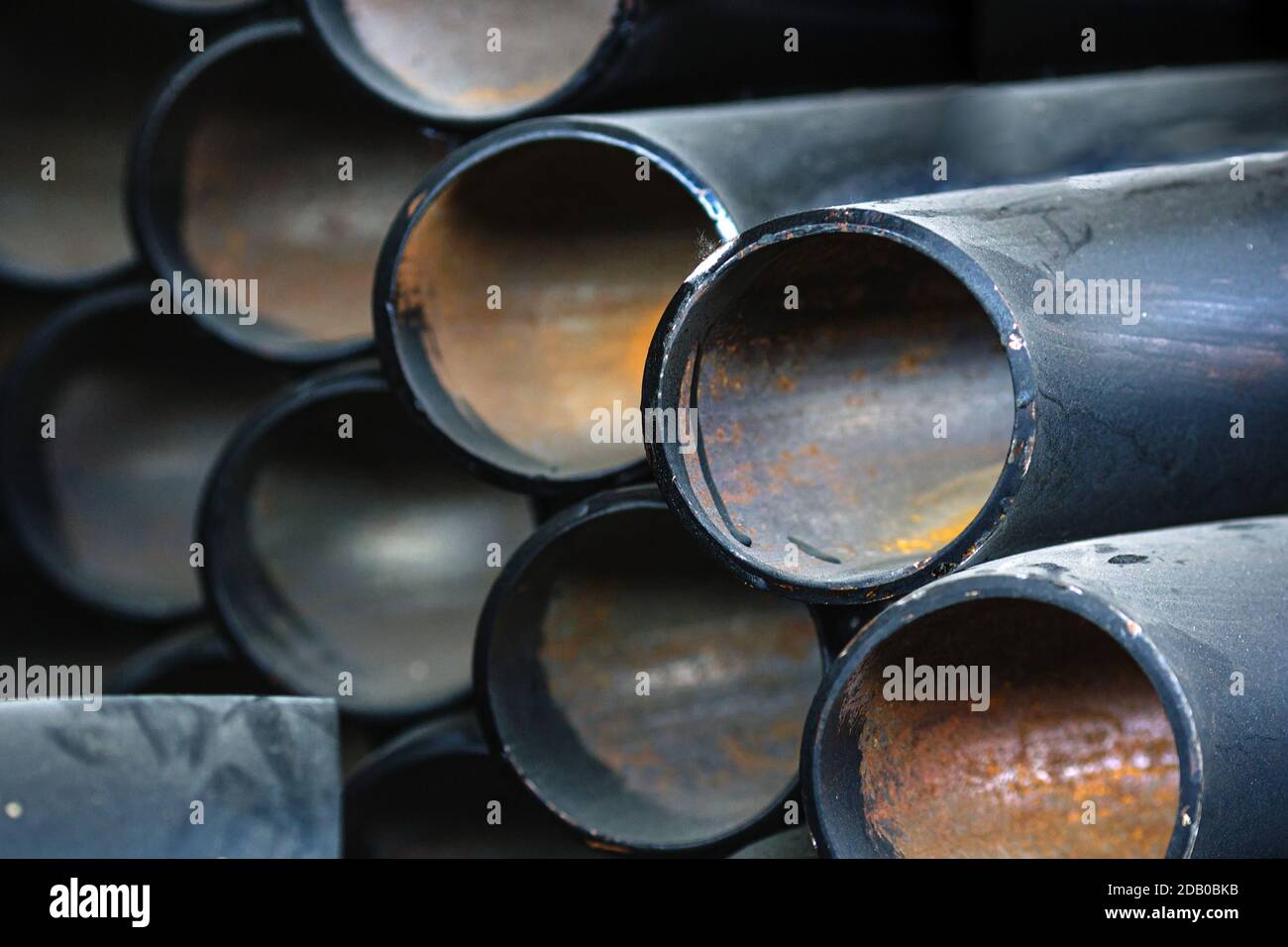 Black metal pipes and adapters of different diameters for gasification ...