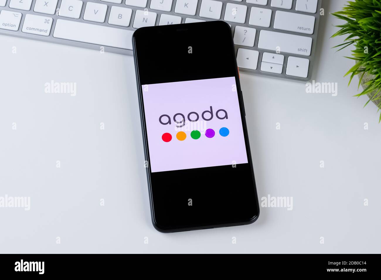 Agoda app logo on a smartphone screen Stock Photo - Alamy