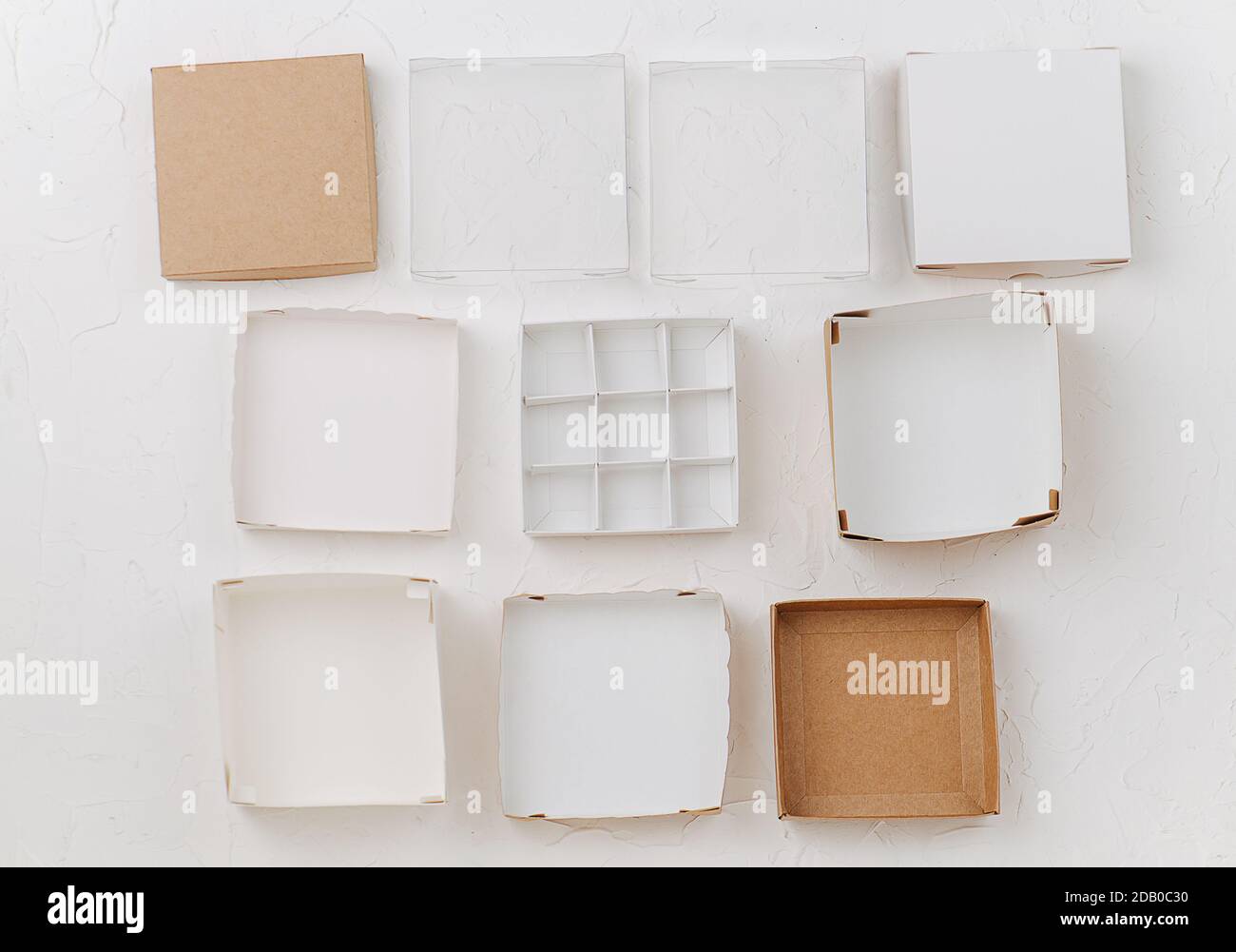 Various possible box parts laid out next to each other on a white ...