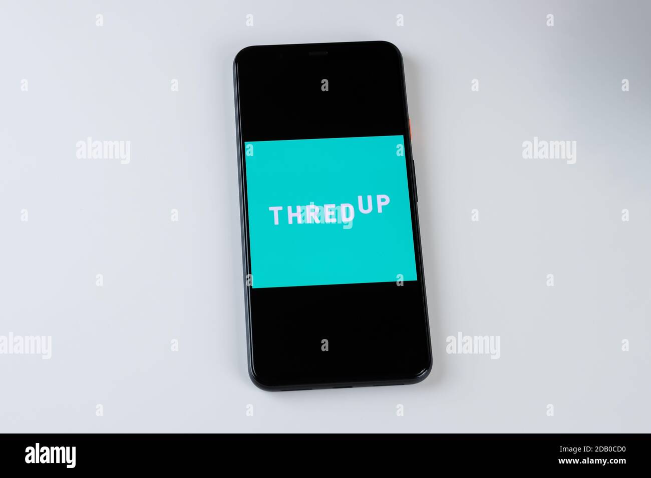 thredUP app logo on a smartphone screen Stock Photo - Alamy