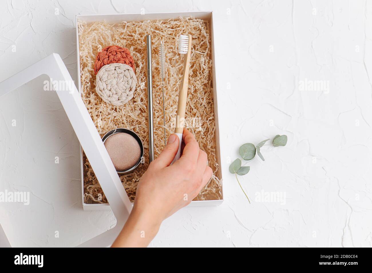 Hand picking wooden toothbrush form box with multi-use eco-friendly ...