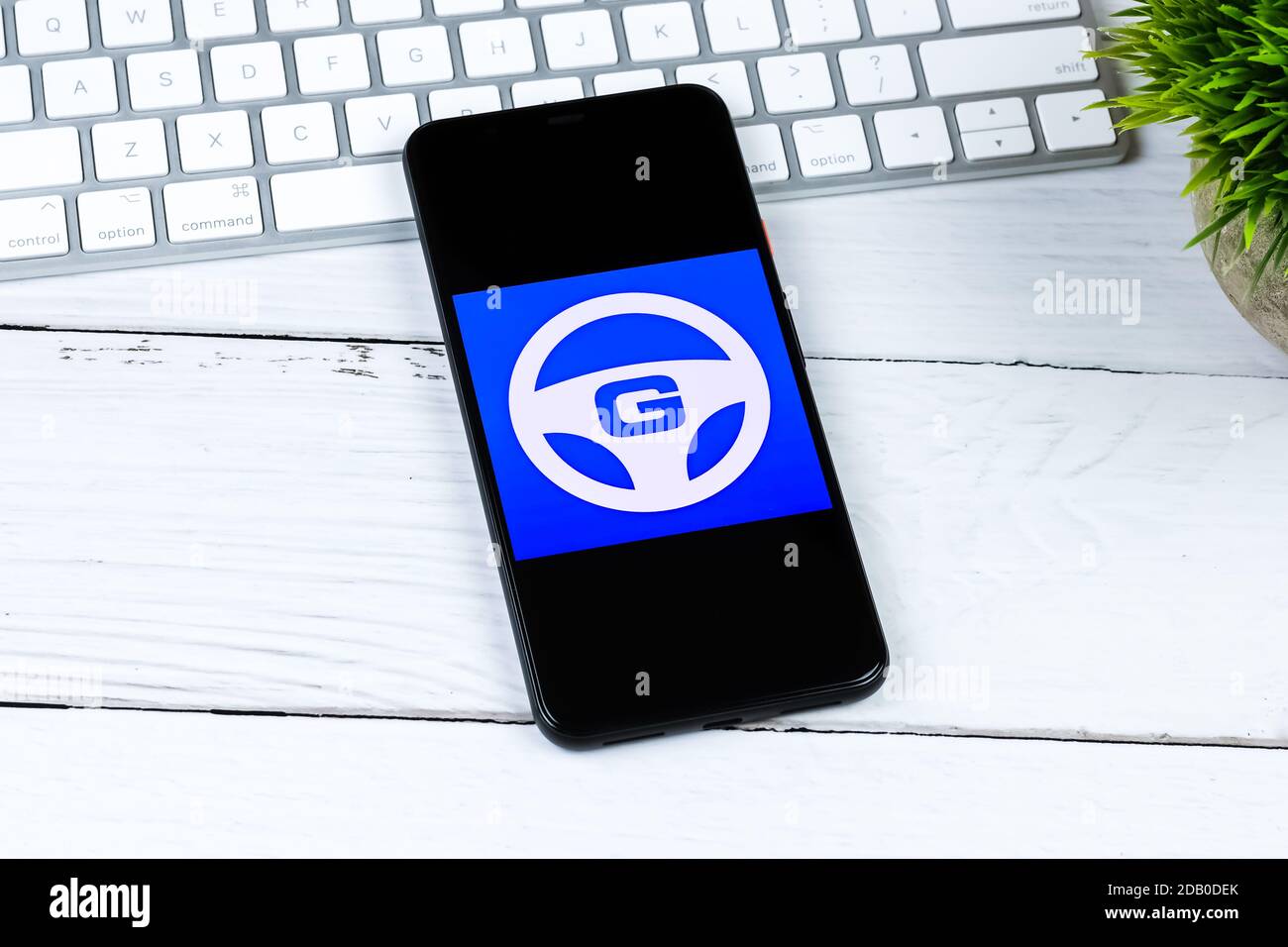 DriveEasy by GEICO app logo on a smartphone screen Stock Photo - Alamy