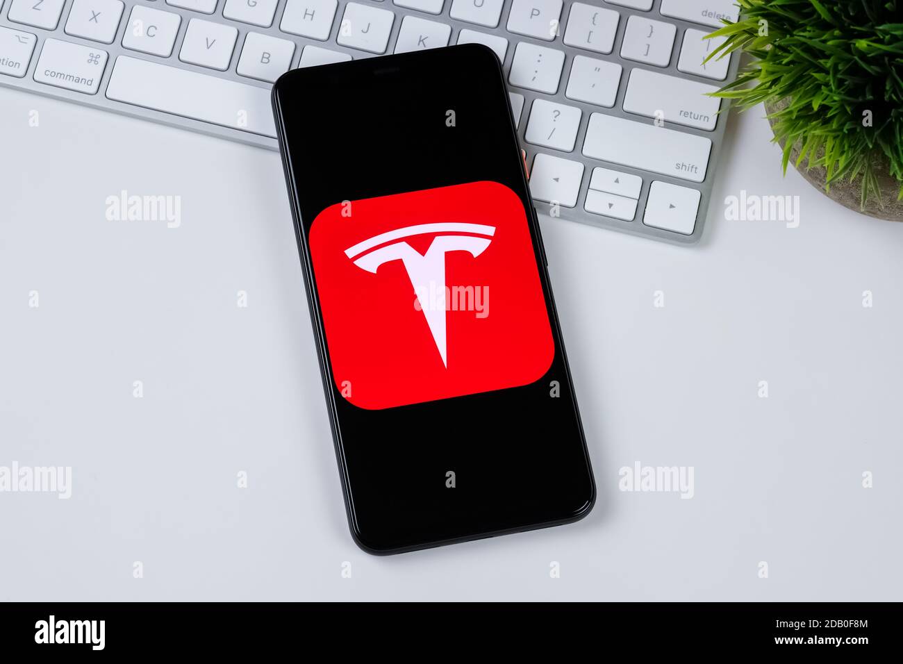Tesla app logo on a smartphone screen Stock Photo - Alamy