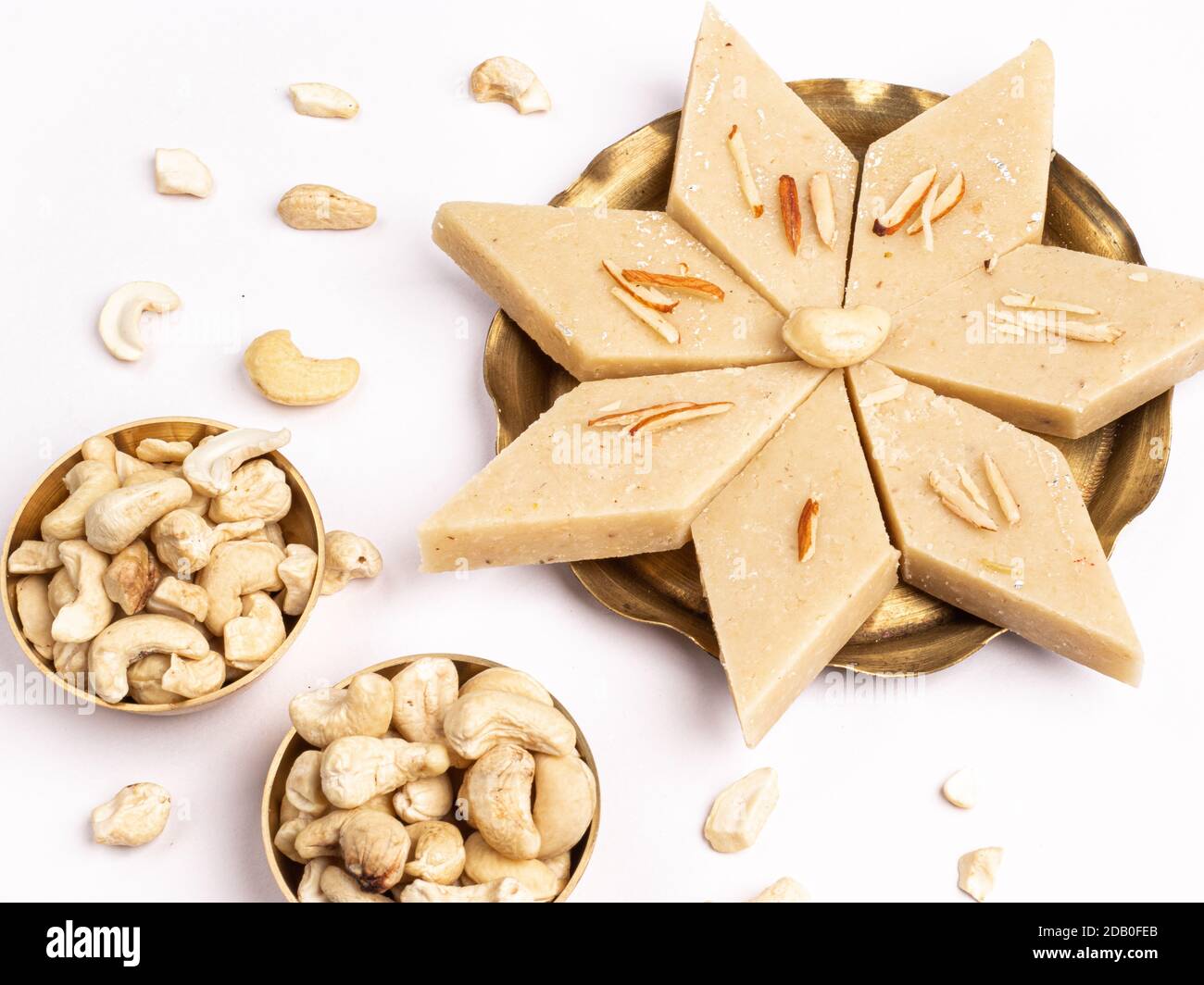 Kaju katli / kaju barfi is a diamond shape indian sweet made with using ...