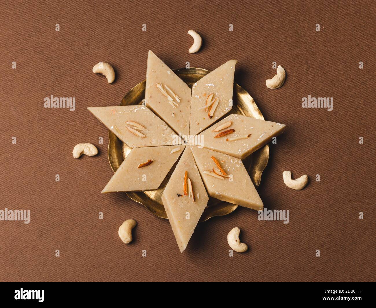 Kaju katli / kaju barfi is a diamond shape indian sweet made with using ...