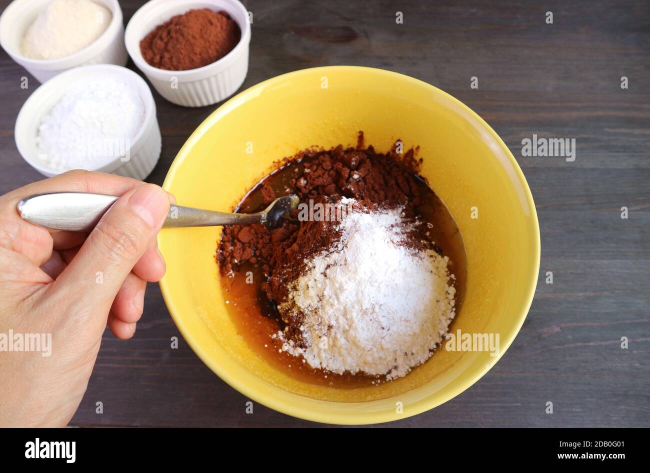 Hand Mixing Ingredient in a Bowl for Baking Chocolate Cake Stock Photo ...