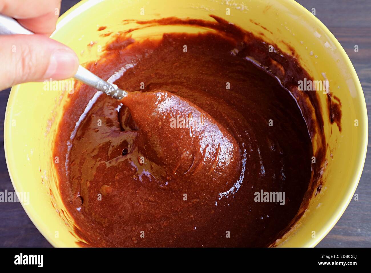 Cake batter wooden spoon hi-res stock photography and images - Alamy