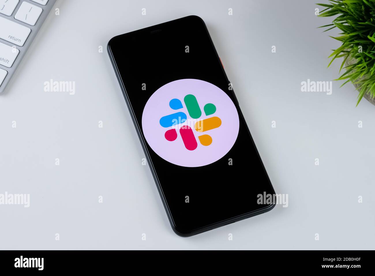 Slack app logo on a smartphone screen Stock Photo - Alamy