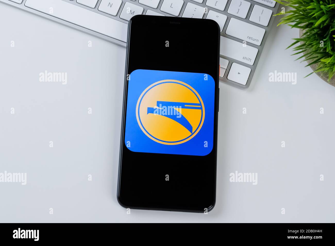 FlyUIA - Ukraine International Airlines app logo on a smartphone screen ...
