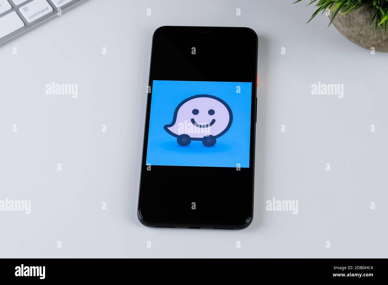 Waze app logo on a smartphone screen Stock Photo - Alamy